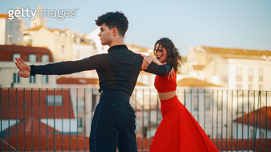 Beautiful Couple Dancing a Latin Dance Outside the City with Old Town ...