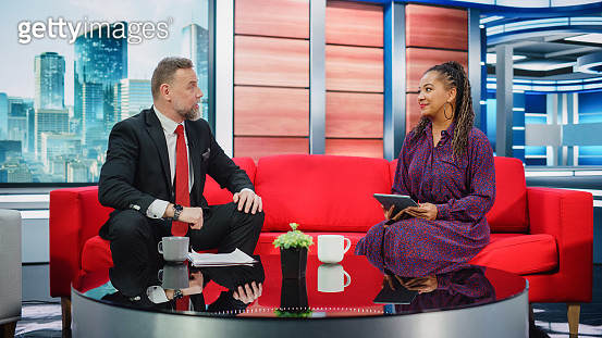 Talk Show TV Program and News Discussion: Two Charismatic Presenters ...