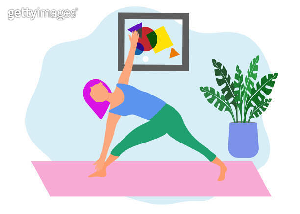 White girl doing yoga in Parivrtta Trikonasana (rotated triangle pose ...