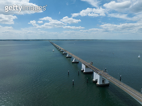 Zeelandbridge infinity bridge in the distance aerial drone view. part ...