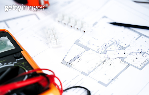 Making repairs,planning electricity project in house.Drawings,diagrams ...