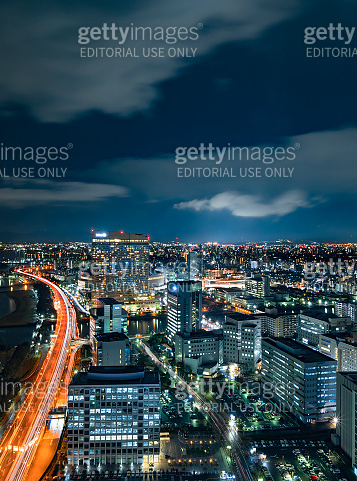Bird's eye view of the illuminated Fukuoka urban expressway circular ...