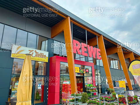 REWE supermarket. The REWE Group is a German diversified retail and ...