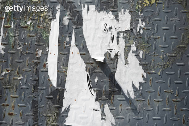 abstract torn paper poster on the ferrous metal for background texture ...