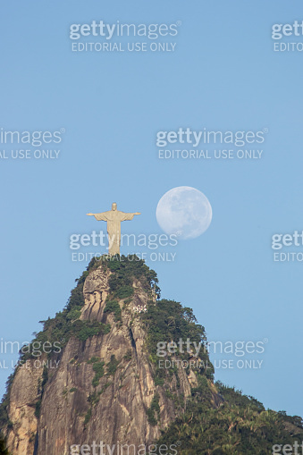 Christ the Redeemer and the full moon in Rio de Janeiro, Brazil ...