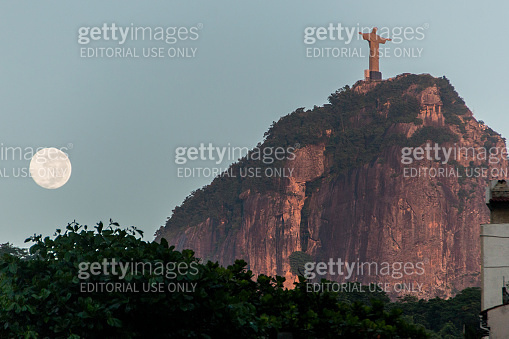 Full moon with Christ the Redeemer in Rio de Janeiro, Brazil ...