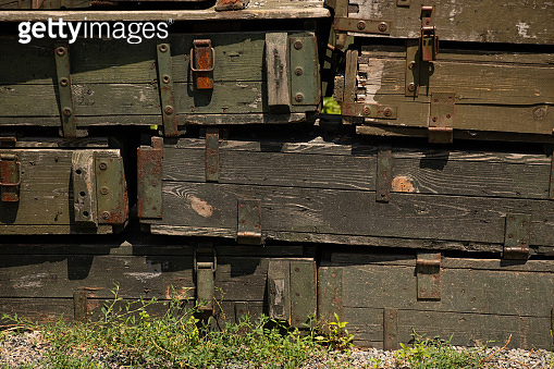 Old green wooden weapon boxes stand outside in the sun,arms 이미지 ...