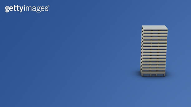 A miniature of a high rise apartment building. city housing. text space ...