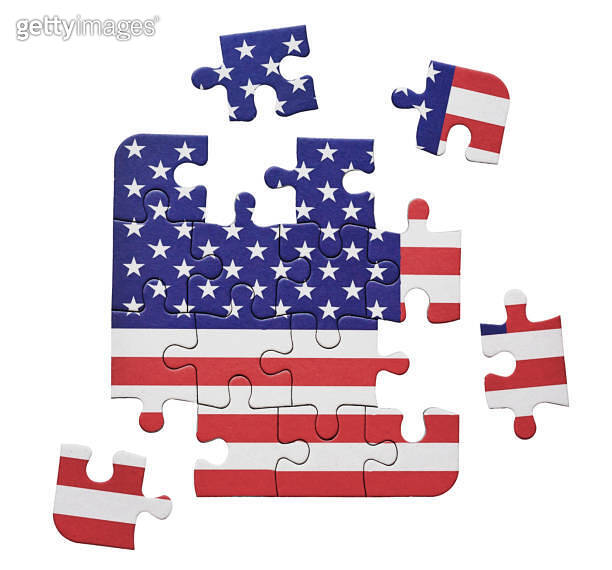 Fragmented jigsaw puzzle of American national flag, representing a ...