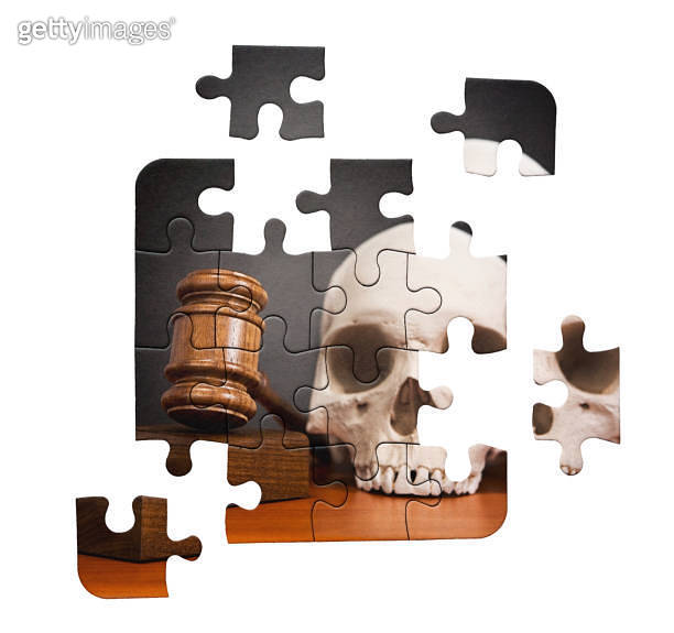 Puzzle of the death penalty: judge's gavel with human skull (1447213128 ...