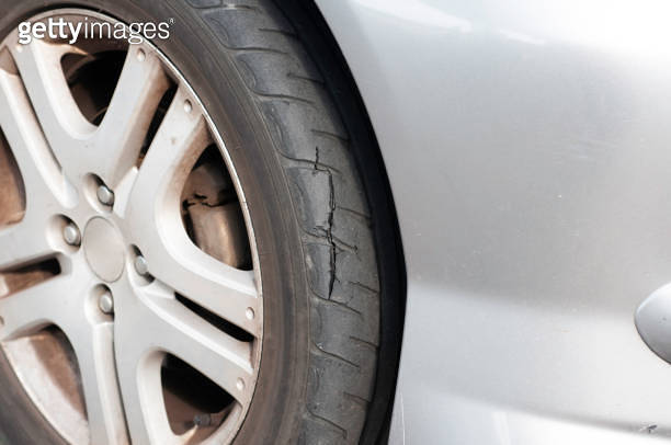 Tear marks on bald tires, car use unsafe tyre dangerous for vehicle ...