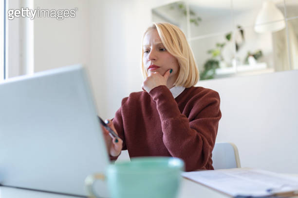 Feeling exhausted. Frustrated young woman looking exhausted while ...
