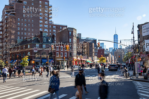 NEW YORK CITY - 2020: Busy crowds of people walking across a congested ... NEW YORK CITY - 2020: Busy crowds of people walking across a congested ...