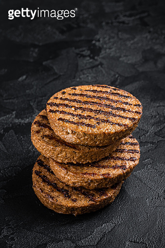 Griiled meat free patties, plant based meat steak cutlets. Black ...