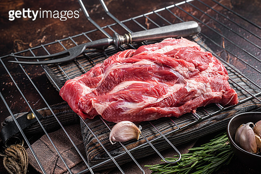 Ready for cooking on grill Boneless lamb meat, raw neck meat with herbs ...