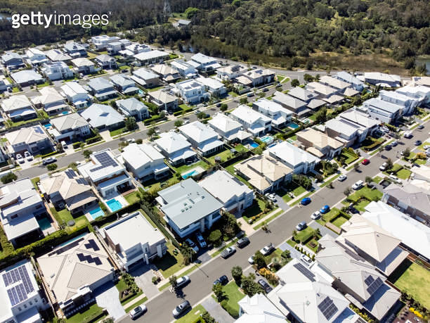Aerial view of new modern coastal suburb, background with copy space ...