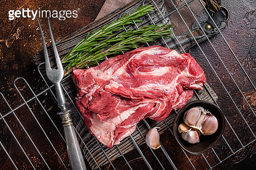 Ready for cooking on grill Boneless lamb meat, raw neck meat with herbs ...