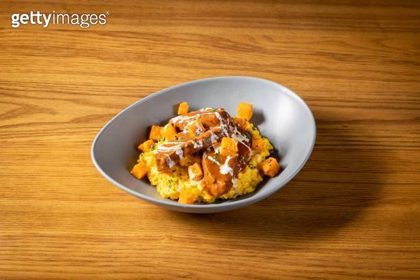 Butternut Squash with Braised Beef Cheek Risotto served in dish ...