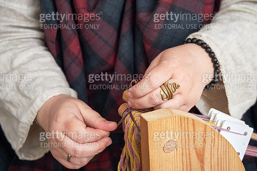An ancient Roman woman makes yarn and sews from vintage wool ...