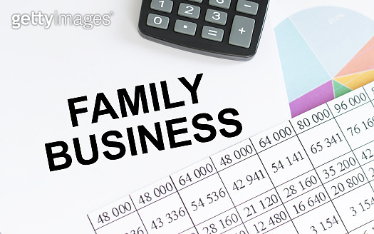 Family Business. Family business written in a white notepad near a pen ...