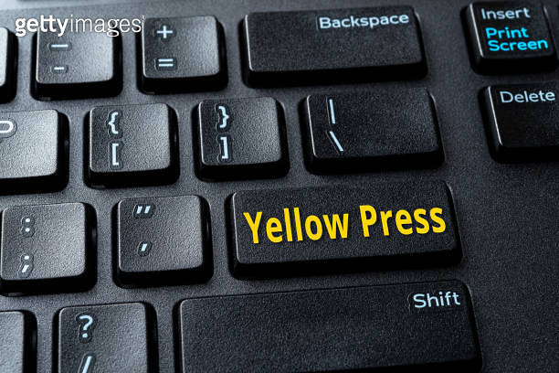 Yellow Press enter key on the black pc keyboard. Concept of ...