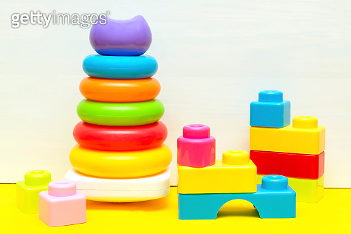 colorful pyramid, constructor, toy blocks for children play on white ...