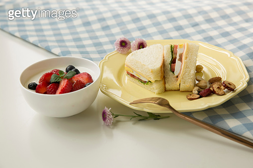 Creative image. Strawberries, blueberries, berries, flavored yogurt ...