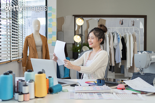 Portrait of freelance designer, tailor, stylist artist Asian woman ...
