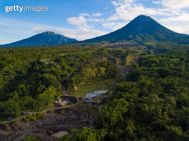 The view of Mount Merapi with the Bebeng River and a lake that holds ...