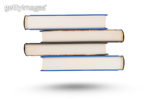 stack of books, isolate on white background. A stack of books of ...