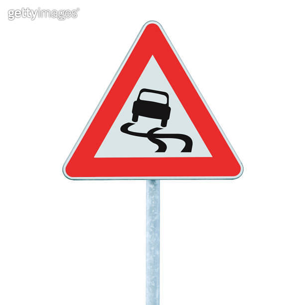 Slippery when wet warning road sign, isolated grey pole post, large ...
