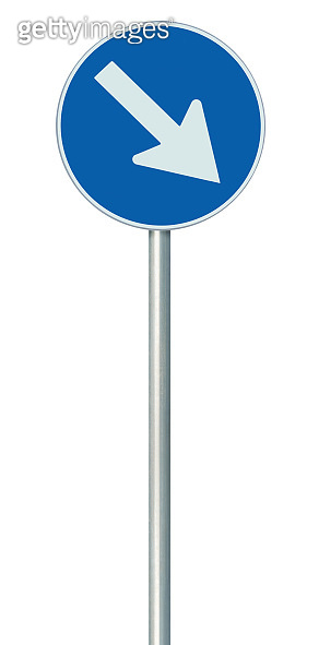 Mandatory keep right European Union EU road sign, grey pole post, large ...