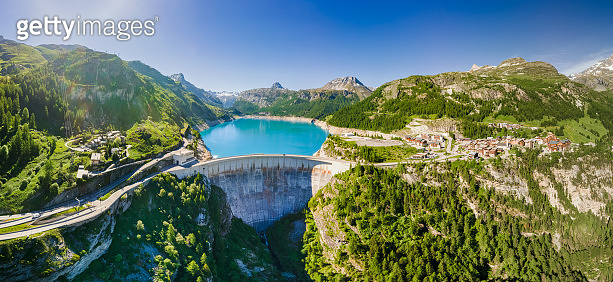 Water dam and reservoir lake aerial panoramic view in French Alps ...