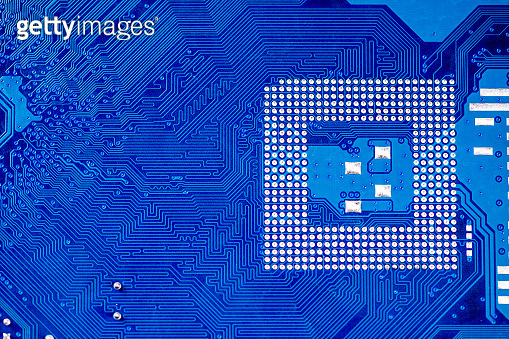 Close-up of a printed blue computer circuit board (1407829987) - 게티이미지뱅크
