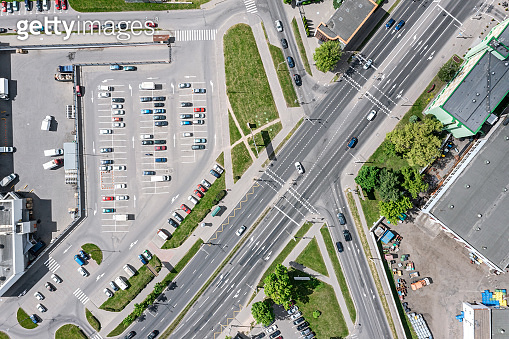 aerial photo of urban road intersection in residential area on a sunny ...