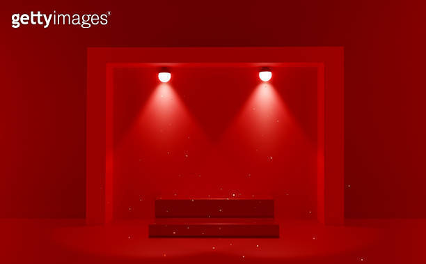 Red Winner stage, rectangular podium illuminated by searchlights. Empty ...