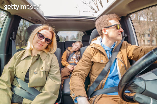 young family with little boy kid inside car. road trip concept 이미지 ...