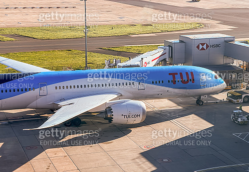 The airplane of TUI airlines staying at Gatwick Airport. (1441632941 ...