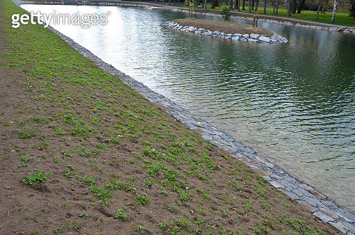 pond sluice, water reservoirs with regulation and concrete dam shaft ...