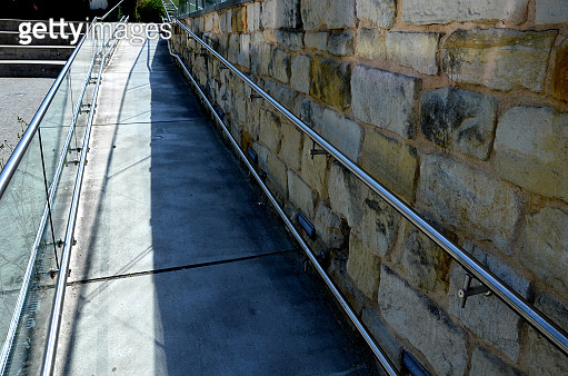 metal railings stairs and ramps for wheelchairs. The ramp is used for ...