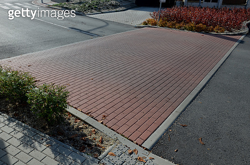safety ramp for slowing down traffic to a residential street where ...