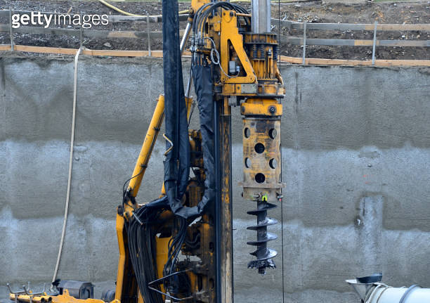 the drilling rig with a pipe drill drills holes for concreting the ...