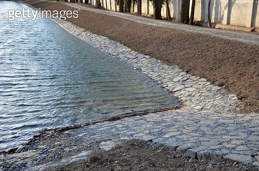 Bridge over safety spillway of the dam. stone bridge with natural ...
