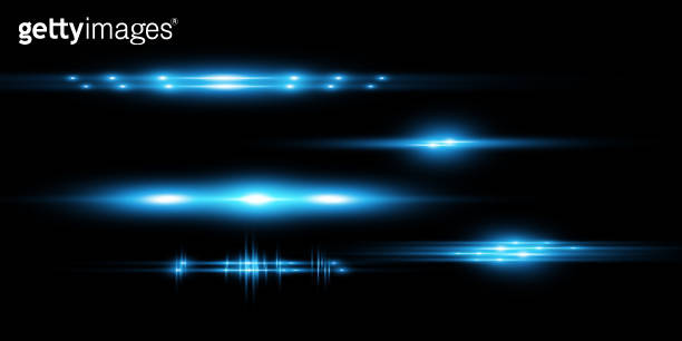 Light blue special effect. Glowing beautiful bright lines on a dark ...