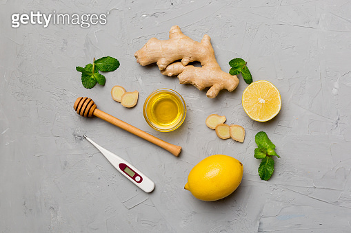 Natural cold and flu home remedies and thermometer. Natural ingredients ...