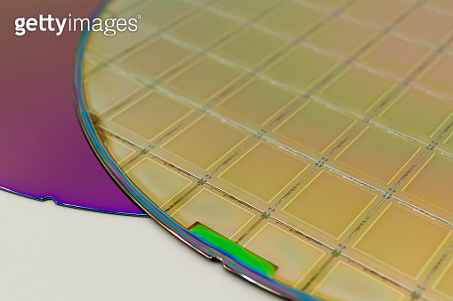 Silicon Wafers two types -empty grey wafer and gold wafes with ...