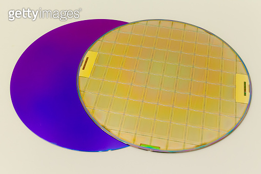 Silicon Wafers two types -empty grey wafer and gold wafes with ...