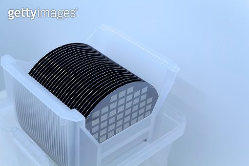 Close up of Silicon wafers grey color with chip cells prepared for ...