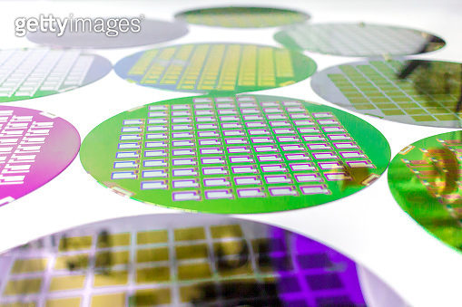 Many Silicon Wafers three types - color wafes with microchips.Color ...