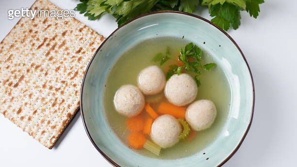 Jewish chicken broth with kneidlach (balls made with matzo meal)Matzo ...